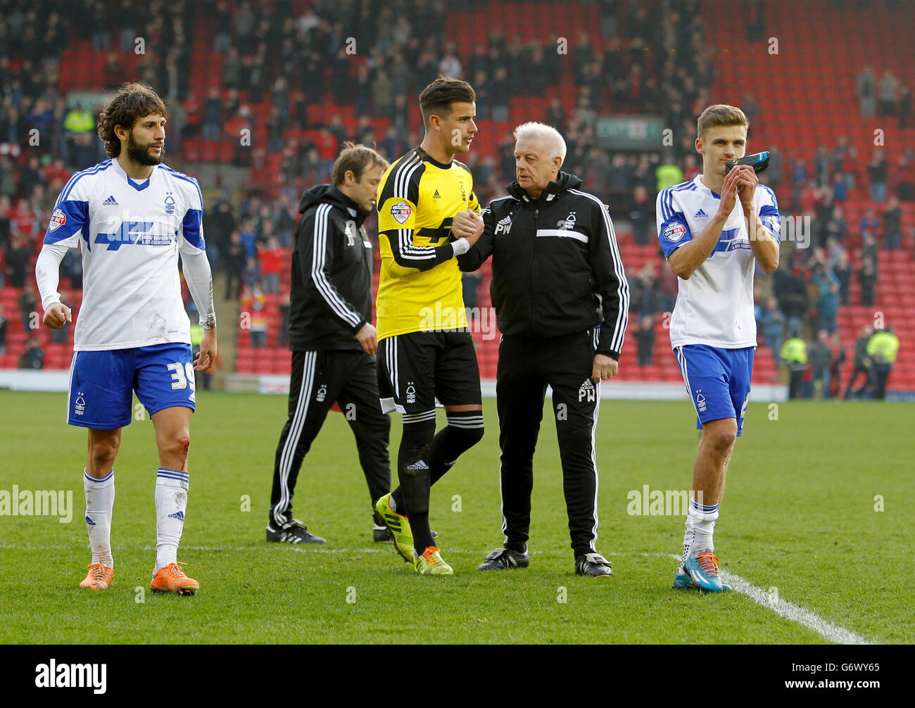 Nottingham Forest's players Djamel Abdoun, left, Karl Darlow, centre ...
