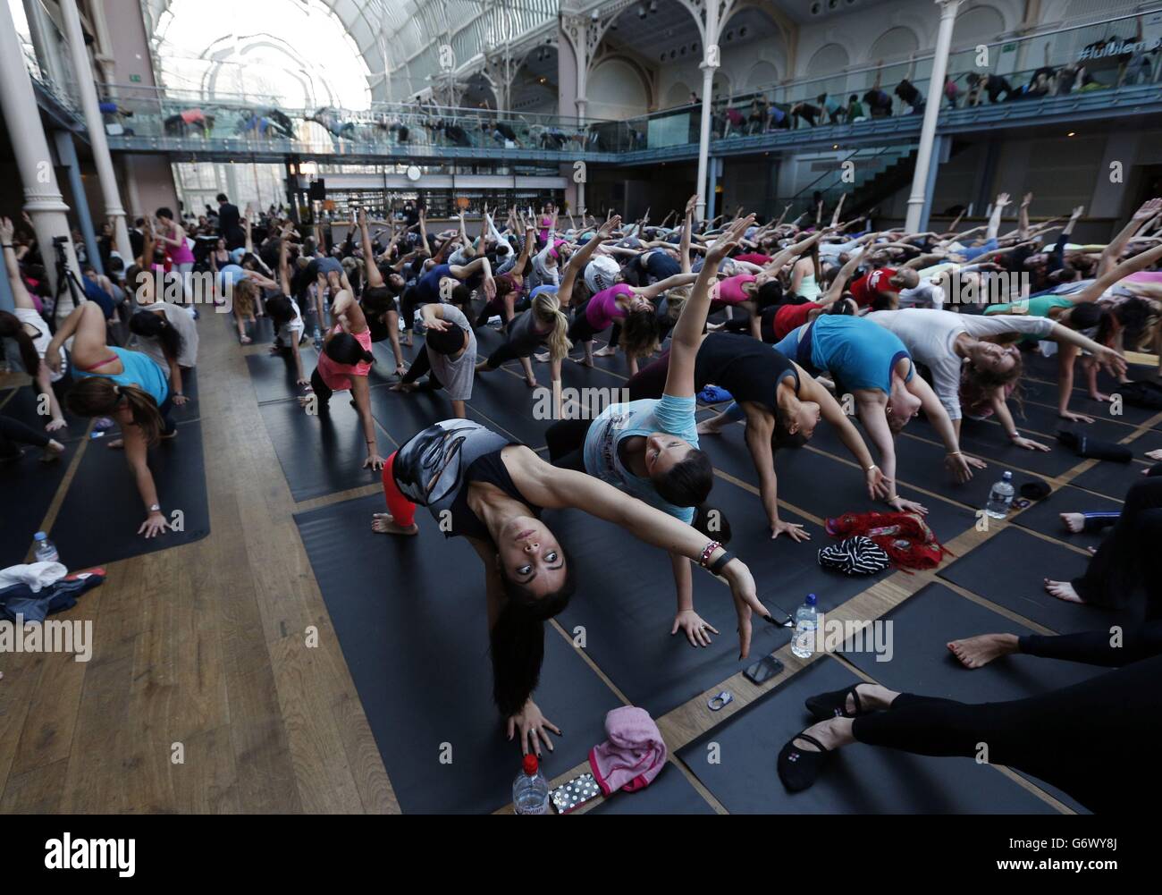 Participants in a yoga class conducted in the Royal Opera House ...