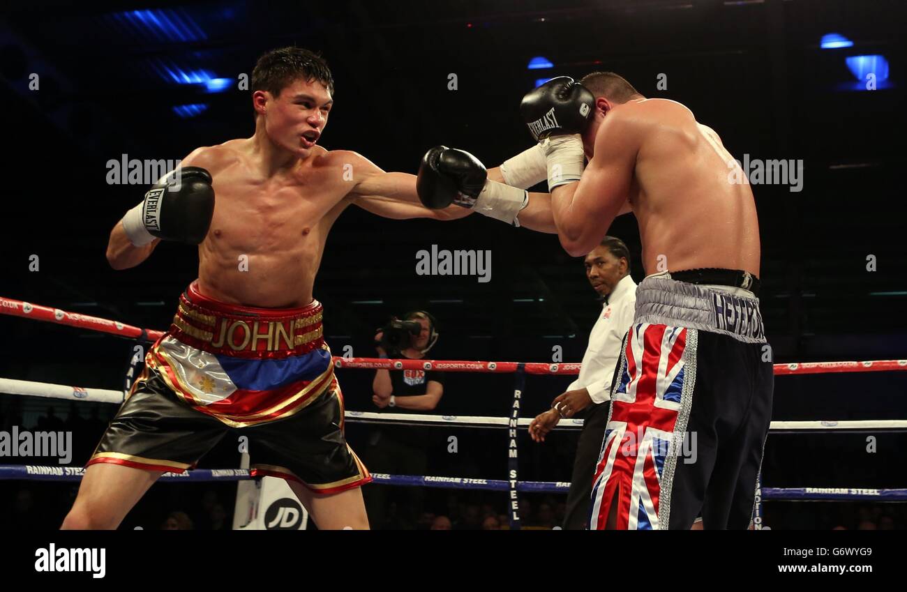 John thain lands a punch on ronnie heffron in their light middleweight ...