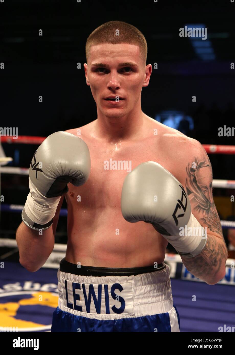 Boxing - Aintree Racecourse. Stephen Lewis celebrates defeating Kevin ...