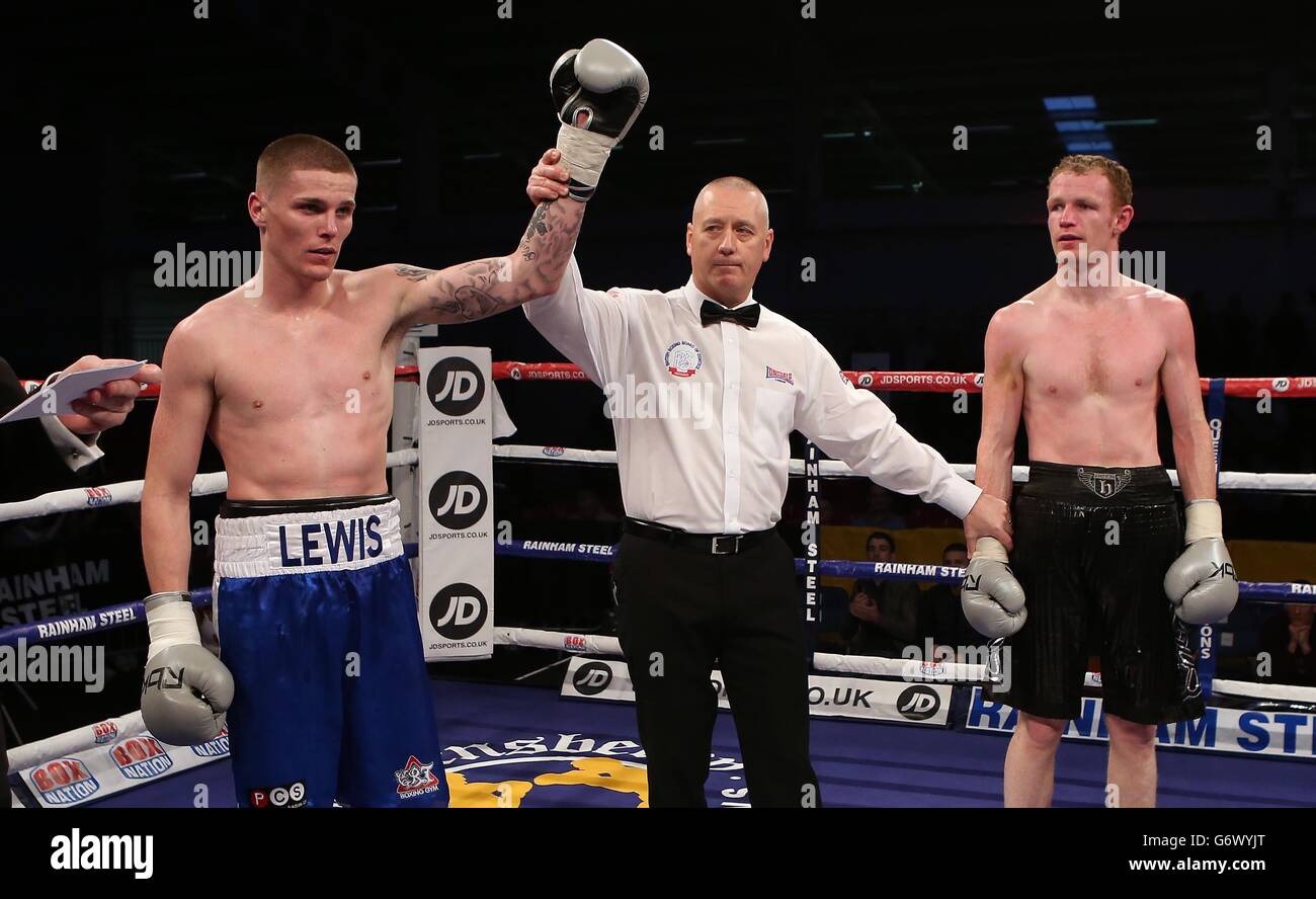 Boxing - Aintree Racecourse. Stephen Lewis (left) celebrates defeating ...