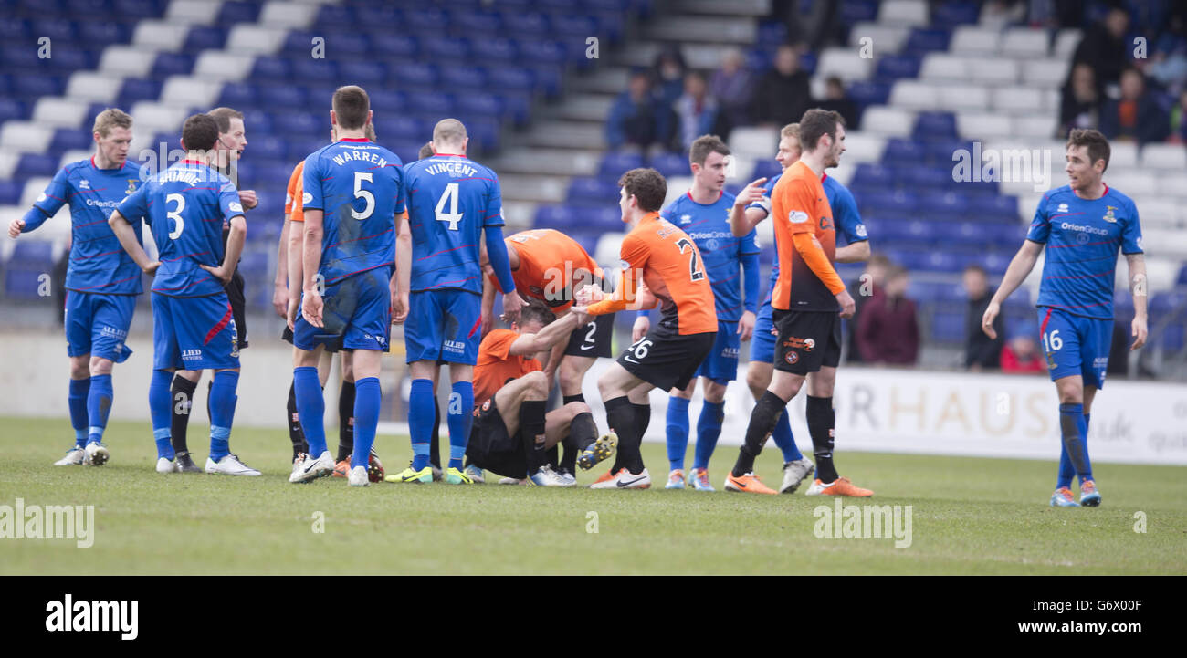 Inverness Caledonian Thistle's Greg Tansey (right) is sent off during ...