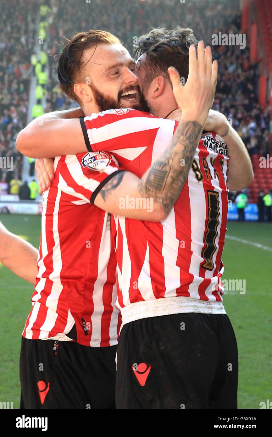 Sheffield United's John Brayford (left) celebrates scoring their second ...
