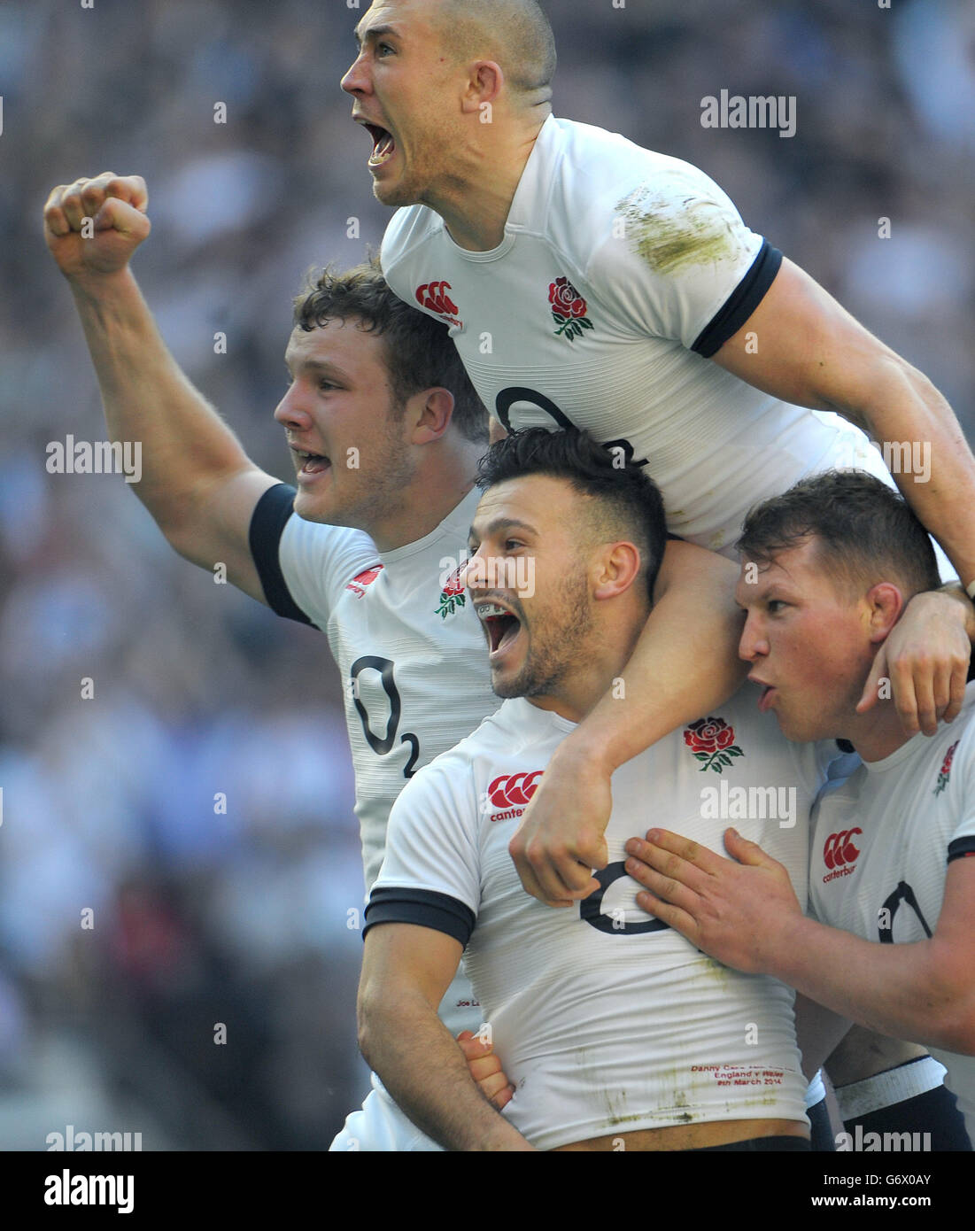 England's Danny Care (centre) celebrates scoring a try during the RBS ...