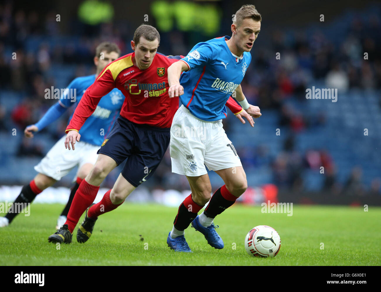Rangers Dean Shields challenges Albion Rovers Alan Reid during the ...
