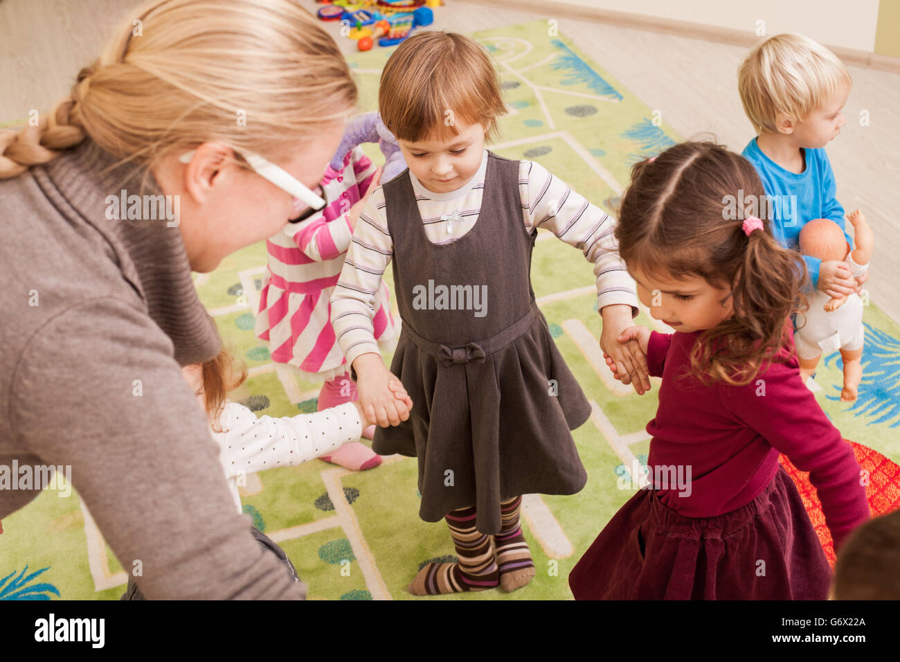 Group of little children dancing Stock Photo - Alamy