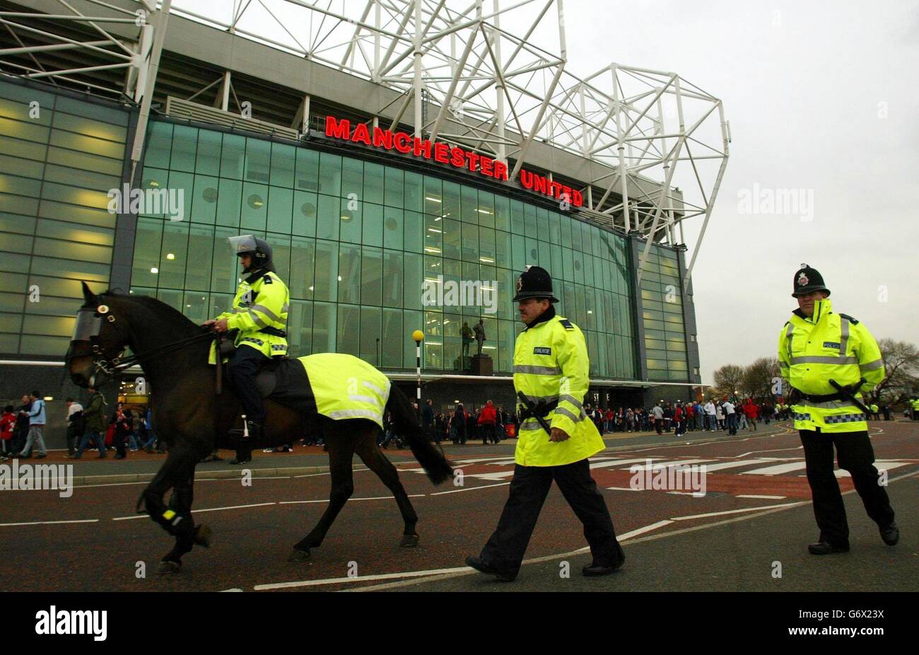 Police officers at Manchester United's Old Trafford ground where extra ...