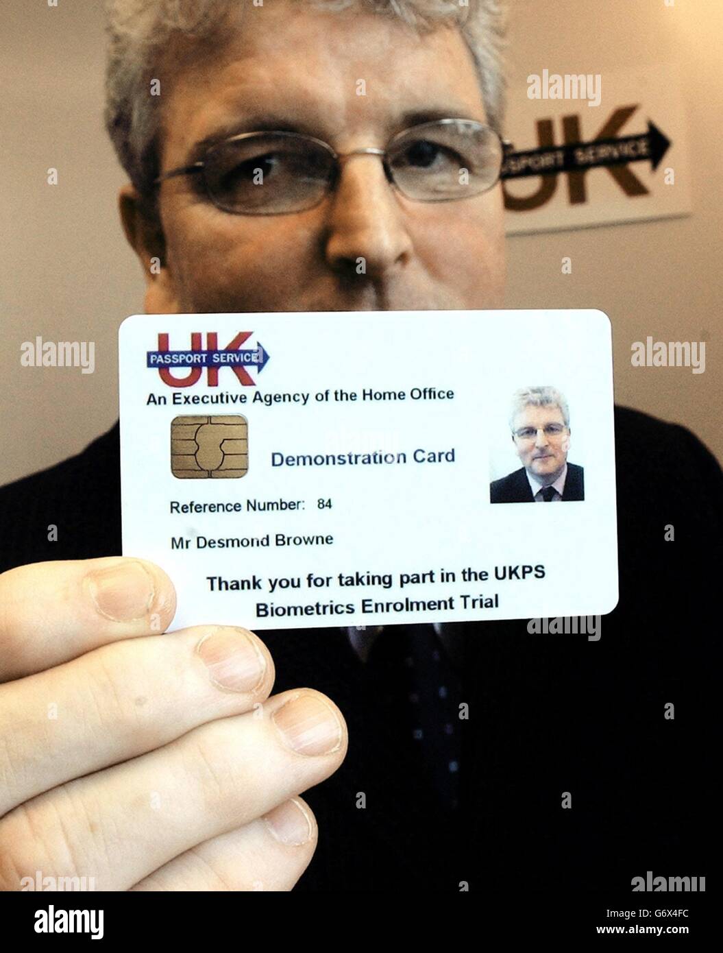 Home Office Immigration Minister Des Brown holds one of the new ...