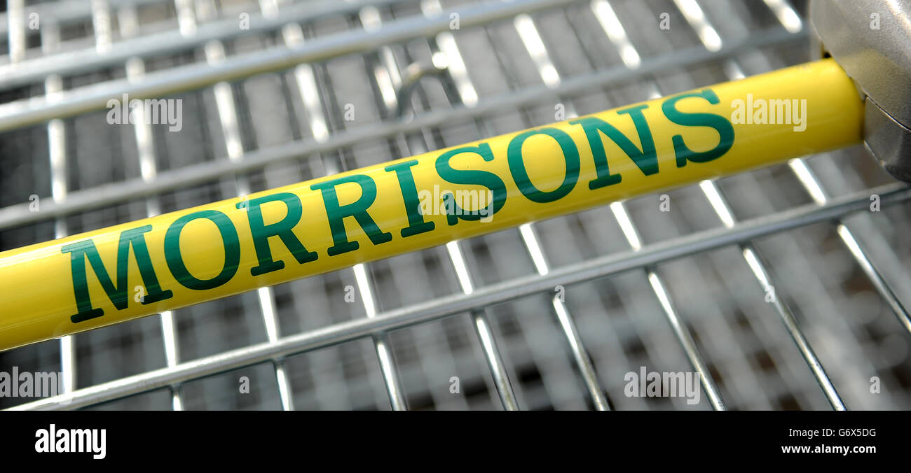 General view of signage for morrisons supermarket on trolley handle hi ...