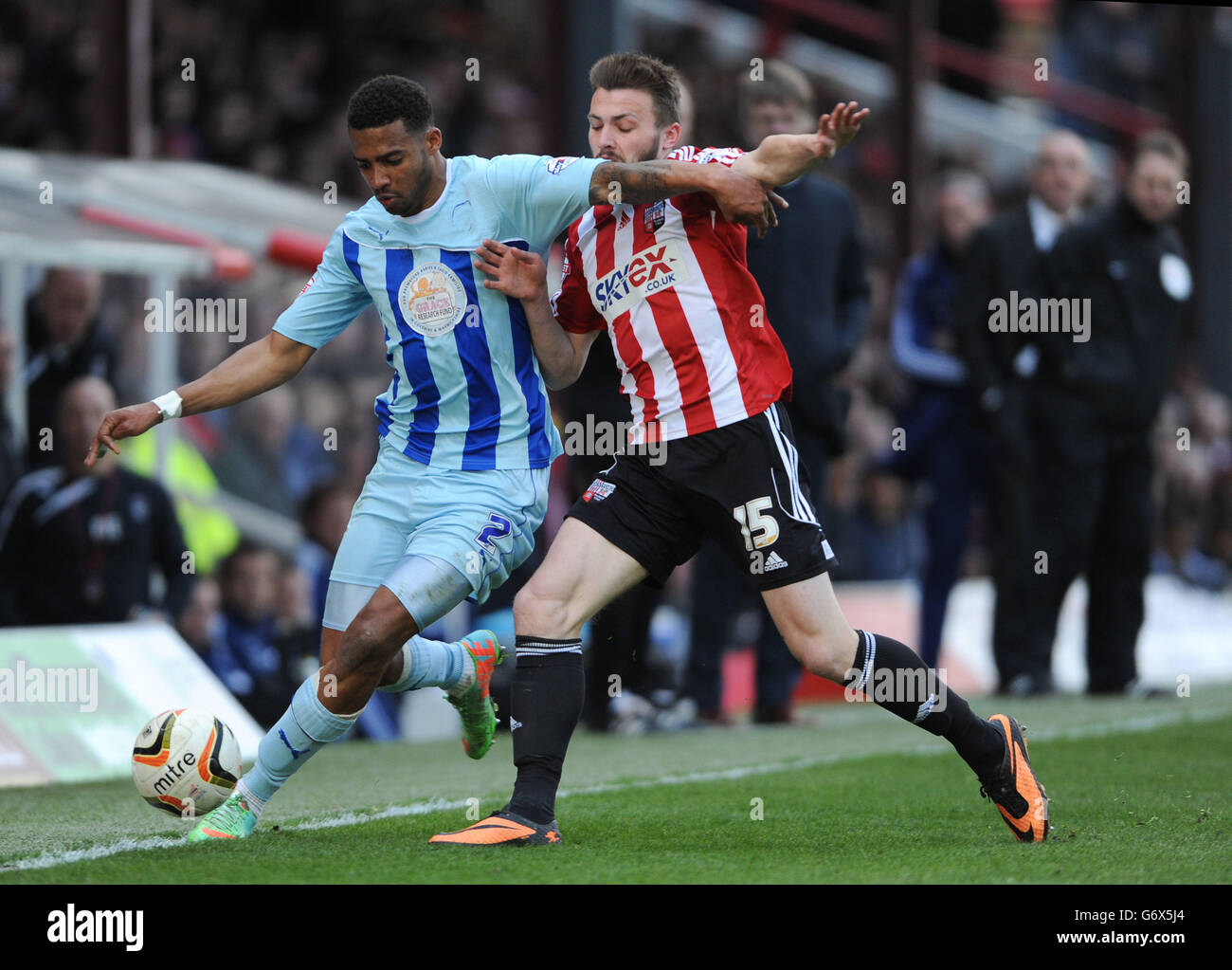 Coventry City's Cyrus and Brentford's Dan Seaborne during the Sky Bet ...