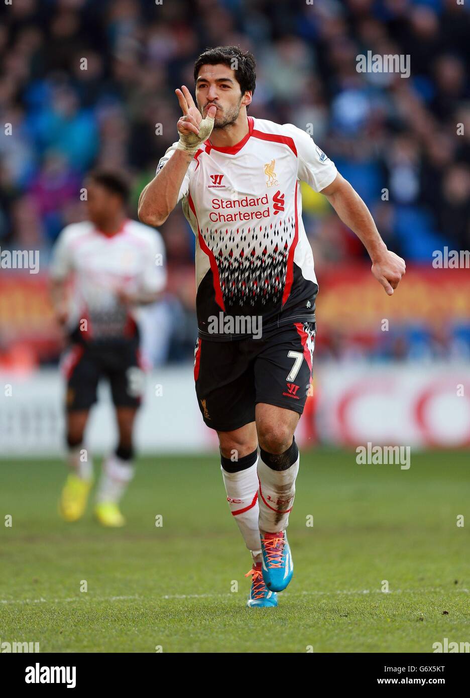 Liverpool's Luis Suarez celebrates scoring his third goal during the ...