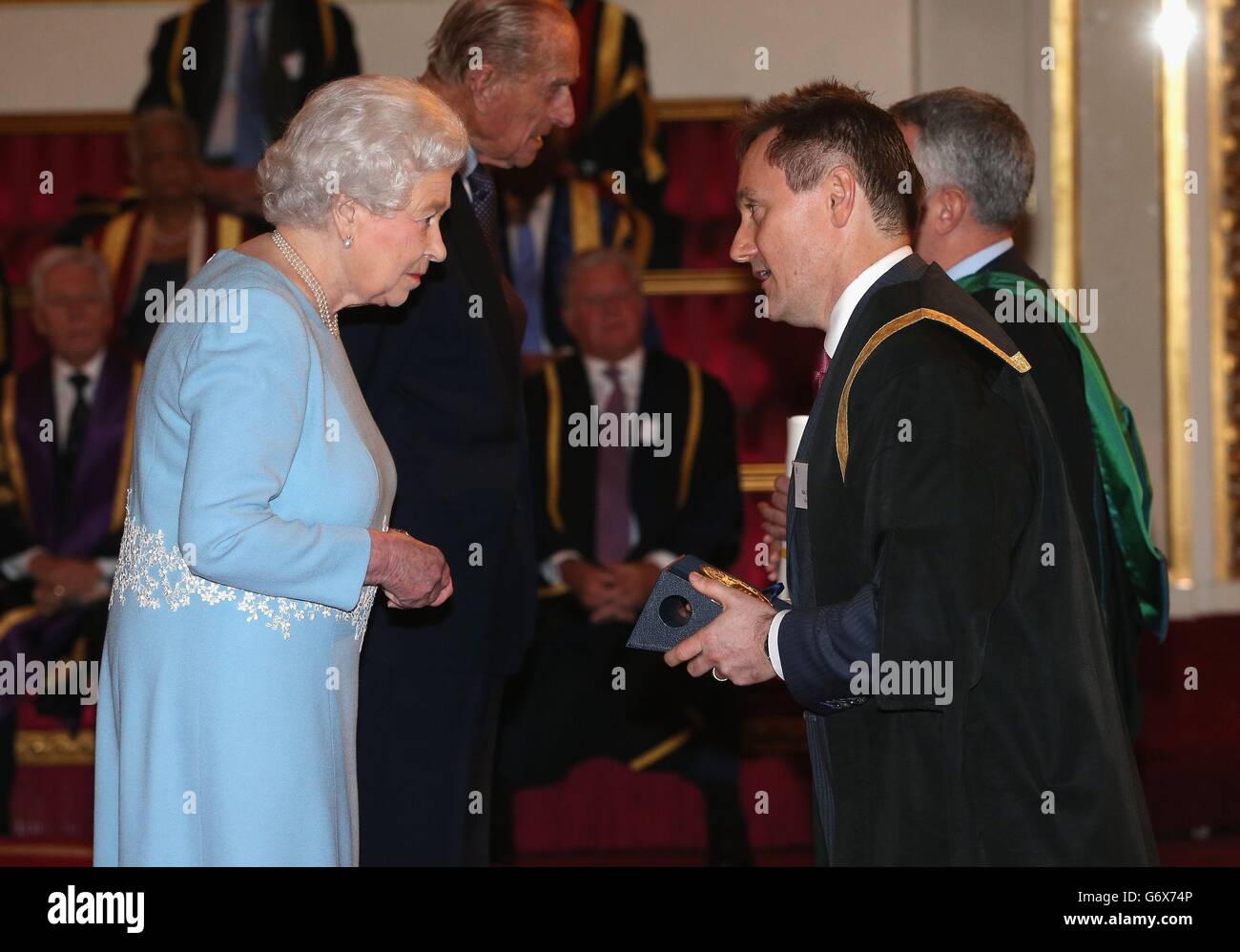 Queen Elizabeth II presents a Queen's Anniversary Prize for Higher and ...