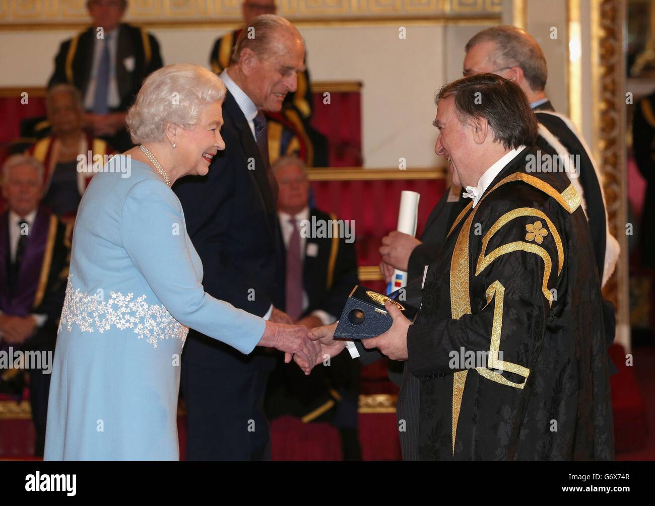 Queen Elizabeth II presents a Queen's Anniversary Prize for Higher and ...