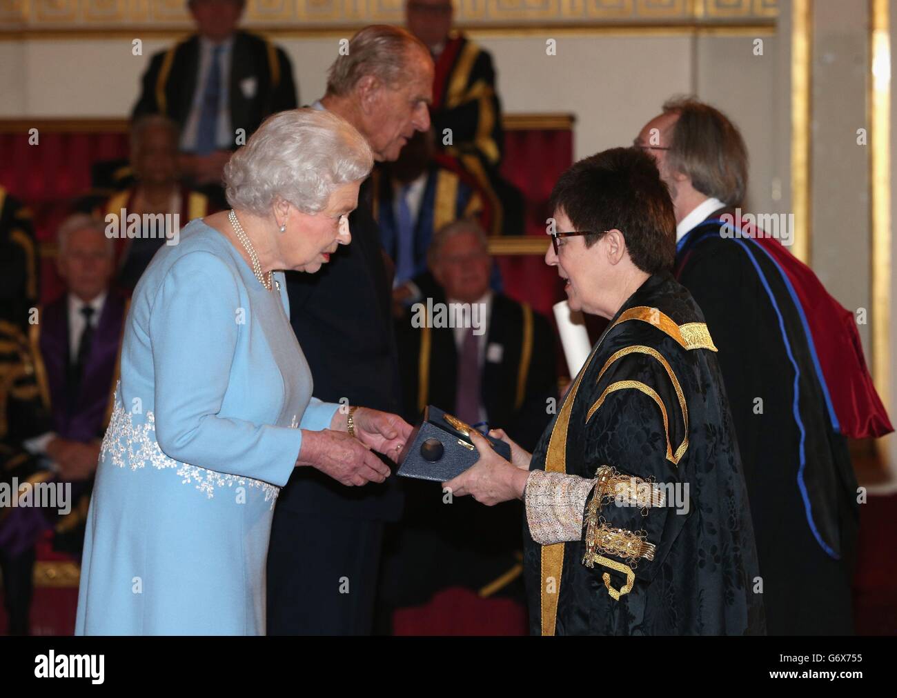 Queen Elizabeth II presents a Queen's Anniversary Prize for Higher and ...
