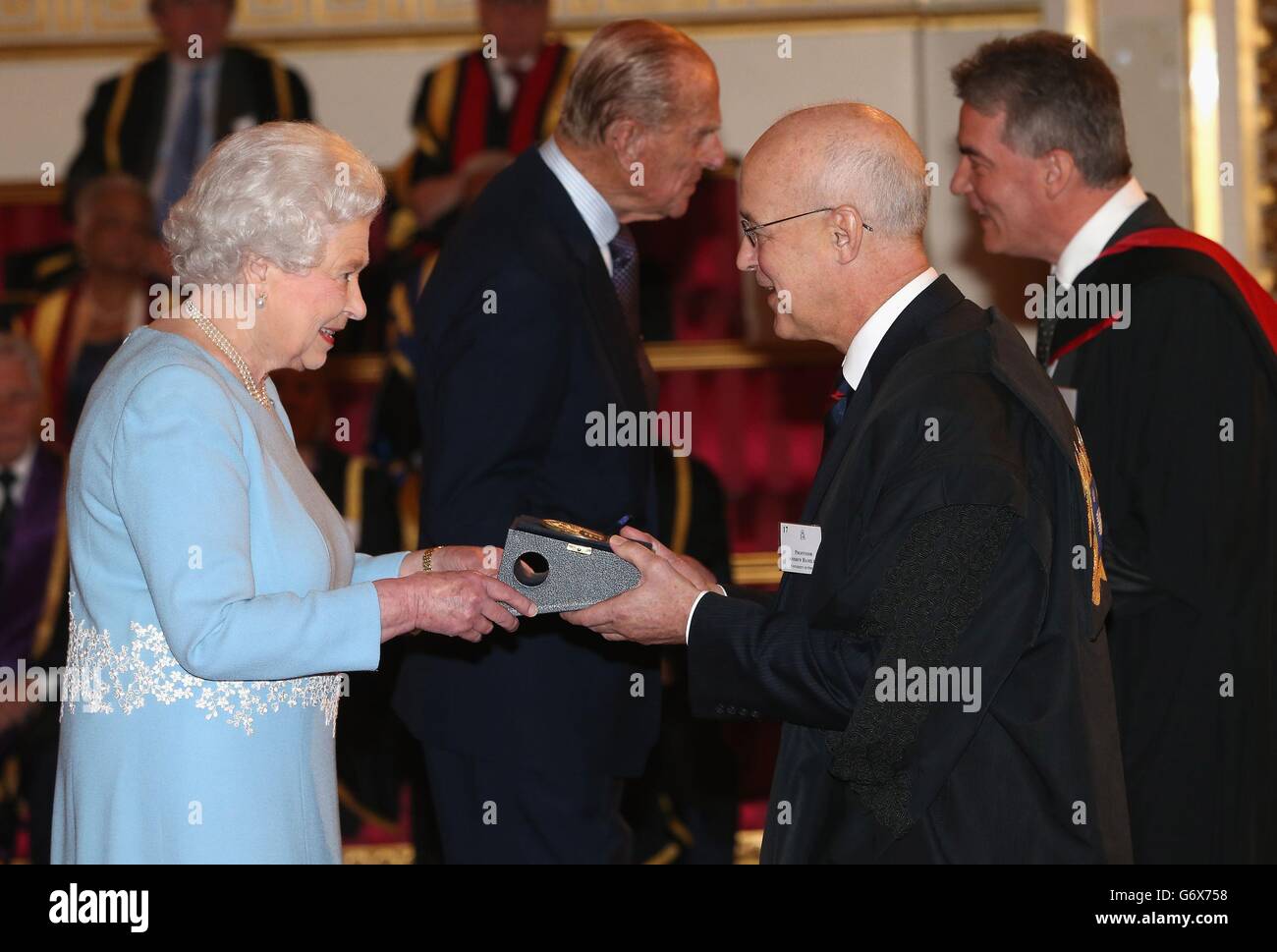 Queen Elizabeth II presents a Queen's Anniversary Prize for Higher and ...