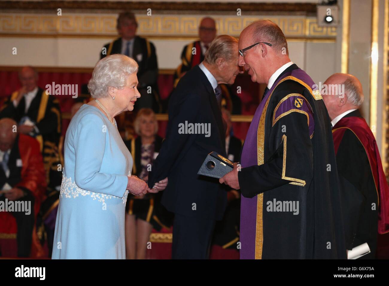 Queen Elizabeth II presents a Queen's Anniversary Prize for Higher and ...