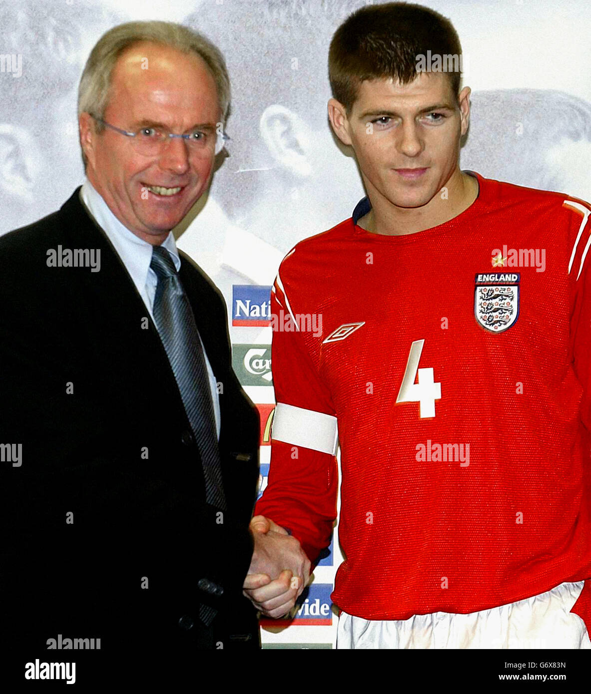 England national soccer coach Sven Goran Eriksson hands over the ...