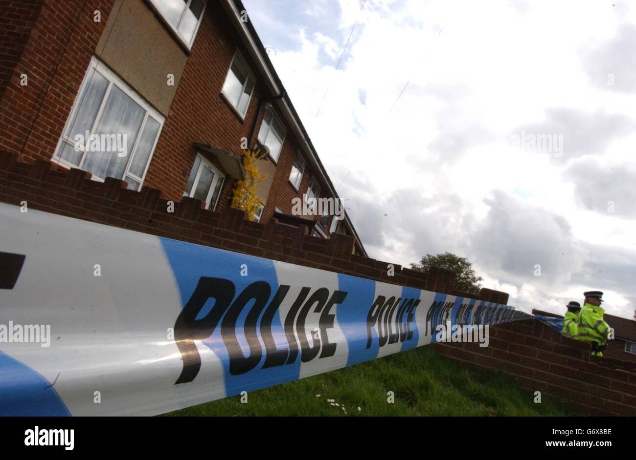 Police officers outside an address in crawley hi-res stock photography ...