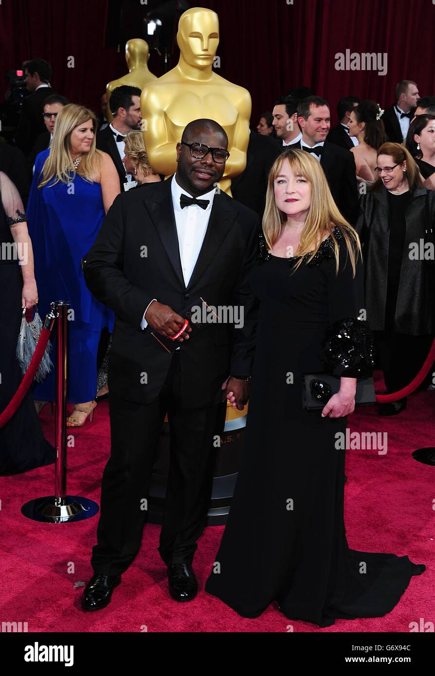 Steve McQueen and Bianca Stigter arriving at the 86th Academy Awards ...