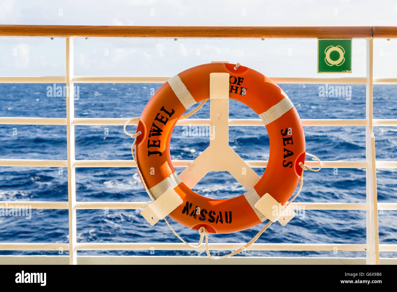 Jewel of the Seas Life Ring on rail of cruise ship with ocean in ...