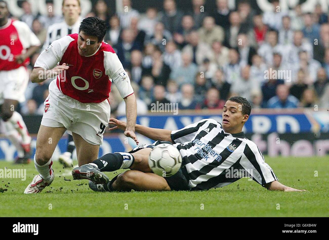 Newcastle United's Jermaine Jenas tackes Arsenal's Jose Reyes during ...