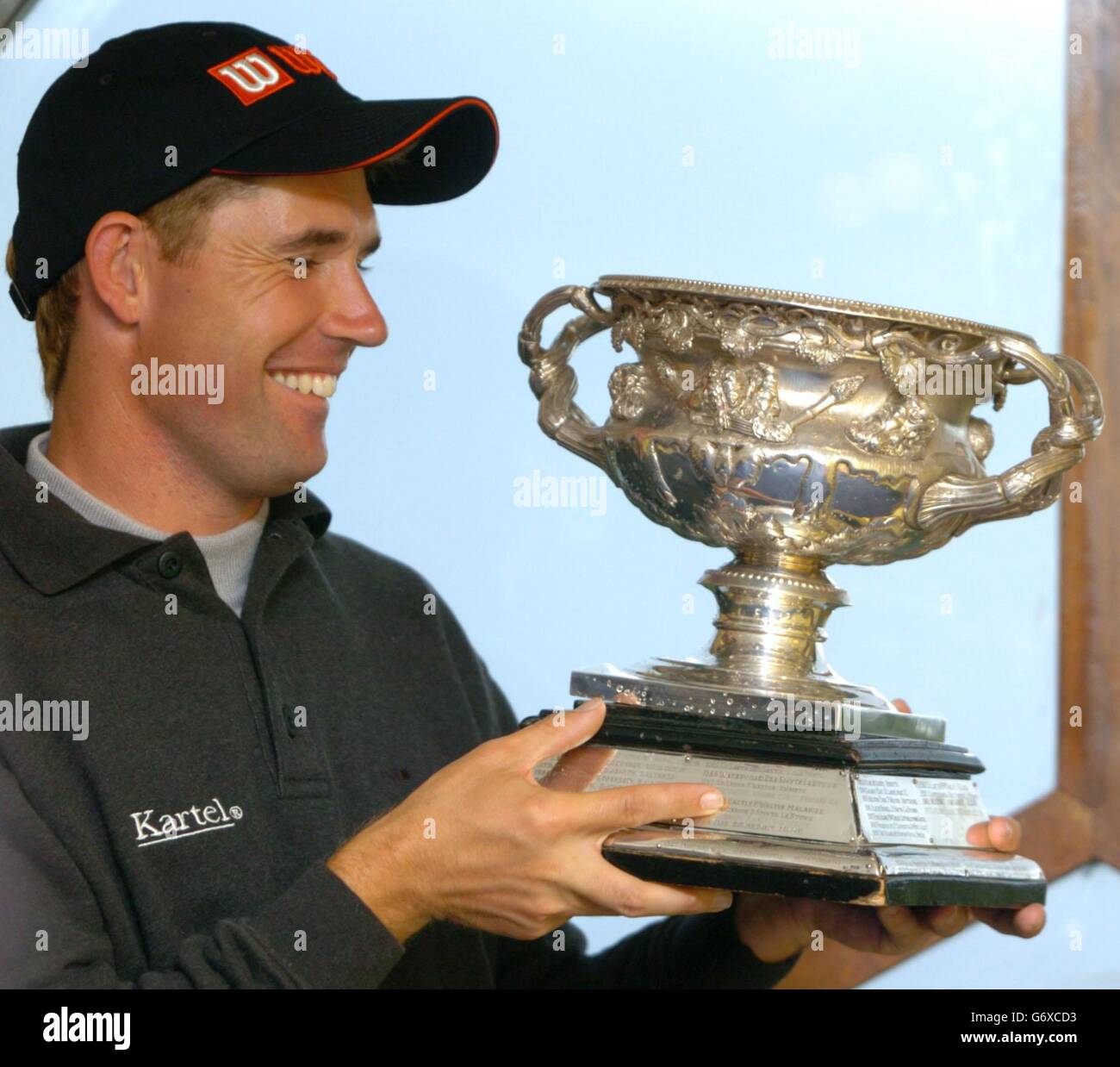 Ireland's Padraig Harrington poses with his trophy after winning the ...