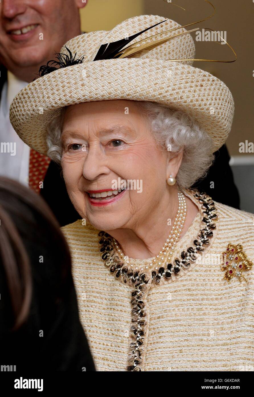 Queen Elizabeth II talks to members of staff during her visit to the ...