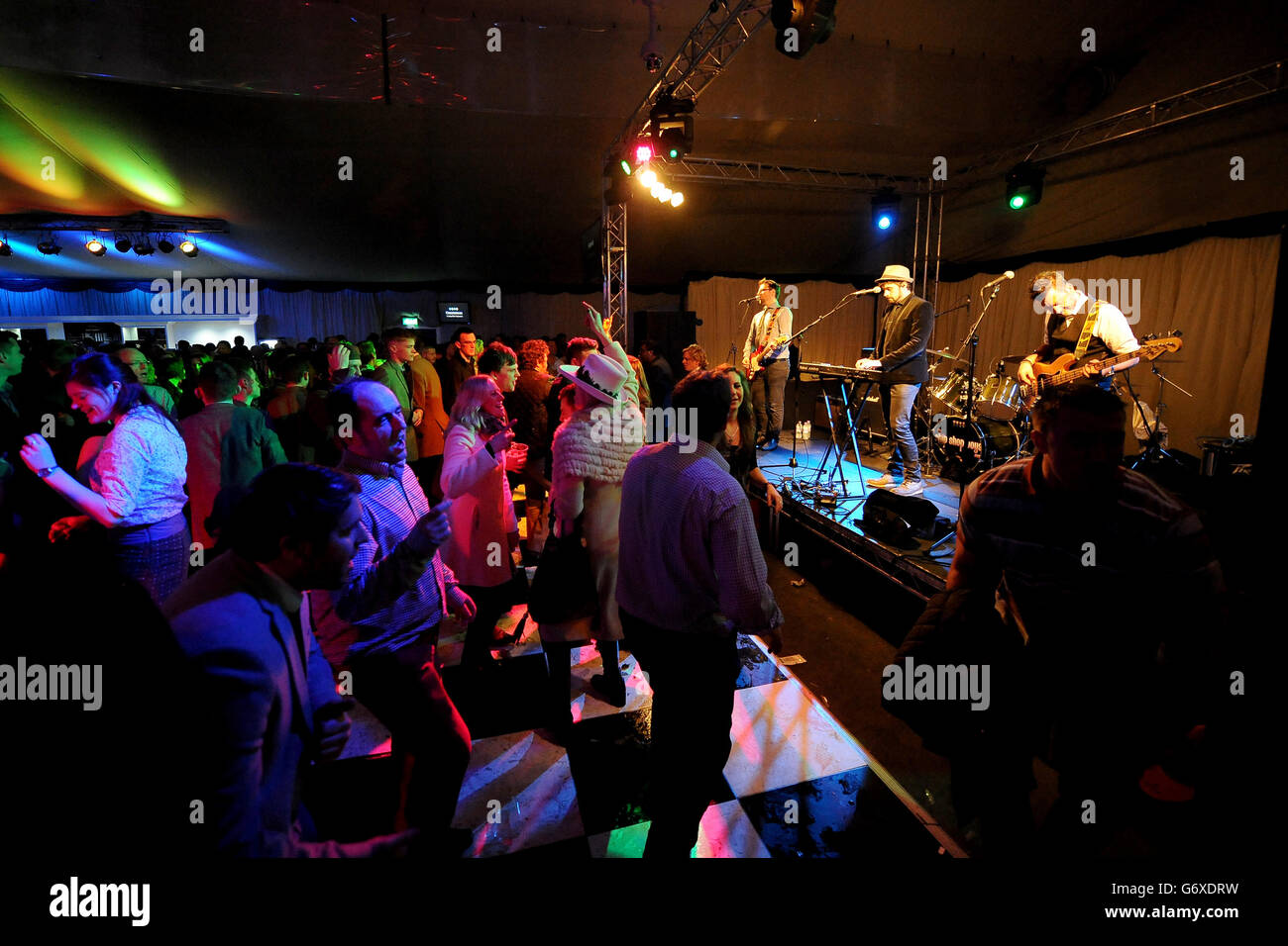 Racegoers on the dance floor as a band perform inside the Final Flight ...