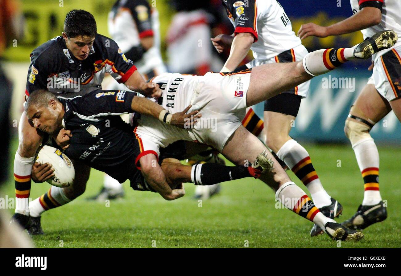 Bradford Bulls's Paul Deacon (left) and Rob Parker tackle Hull FC's ...