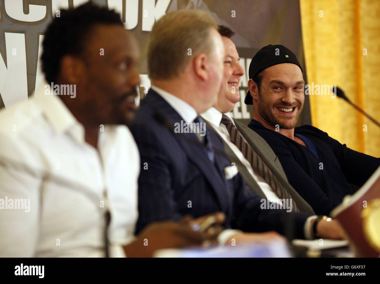 Dereck Chisora promoter Frank Warren, promoter Mick Hennessy, and Tyson ...