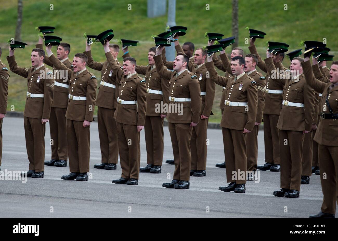 Soldiers give three cheers to the Duke and Duchess of Cambridge during ...