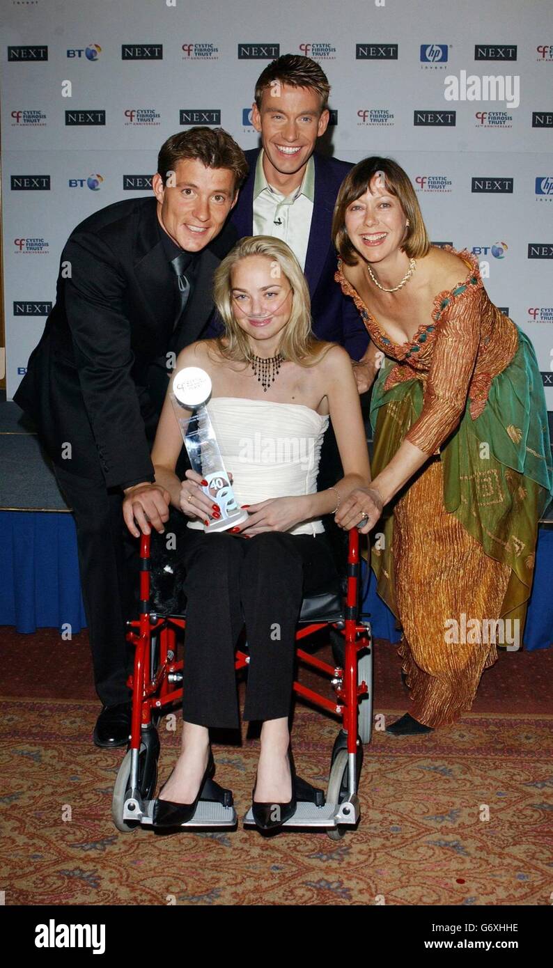 29 year old Nikki West (centre) from London receives an Oustanding ...