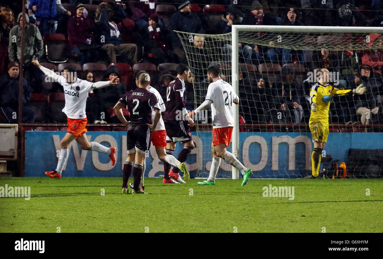 Dundee United's Brian Graham (left) celebrates scoring during the ...