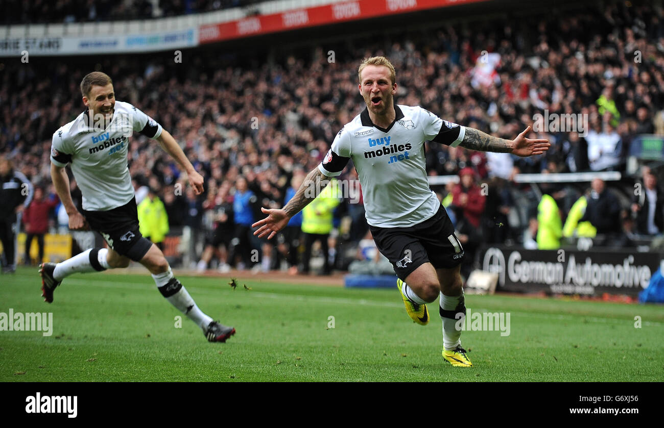 Derby County's Johnny Russell (right) celebrates after scoring his ...