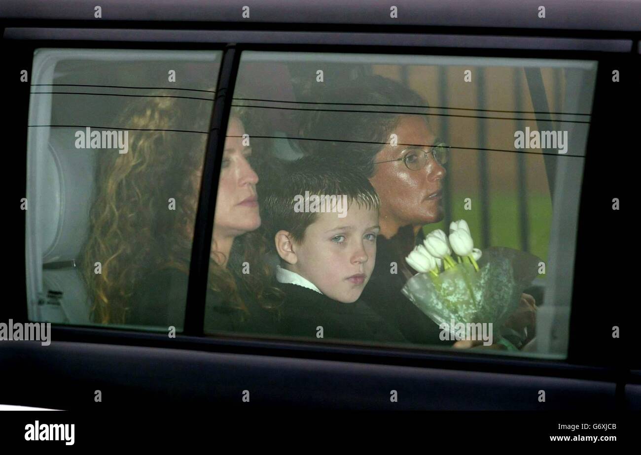 Mother Angela Donald (left) with her son and family member (right ...