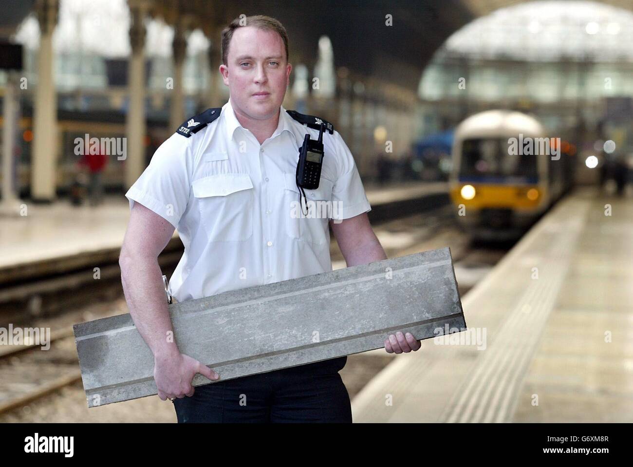 Sgt Richard Mitchell with a slab of concrete Stock Photo - Alamy