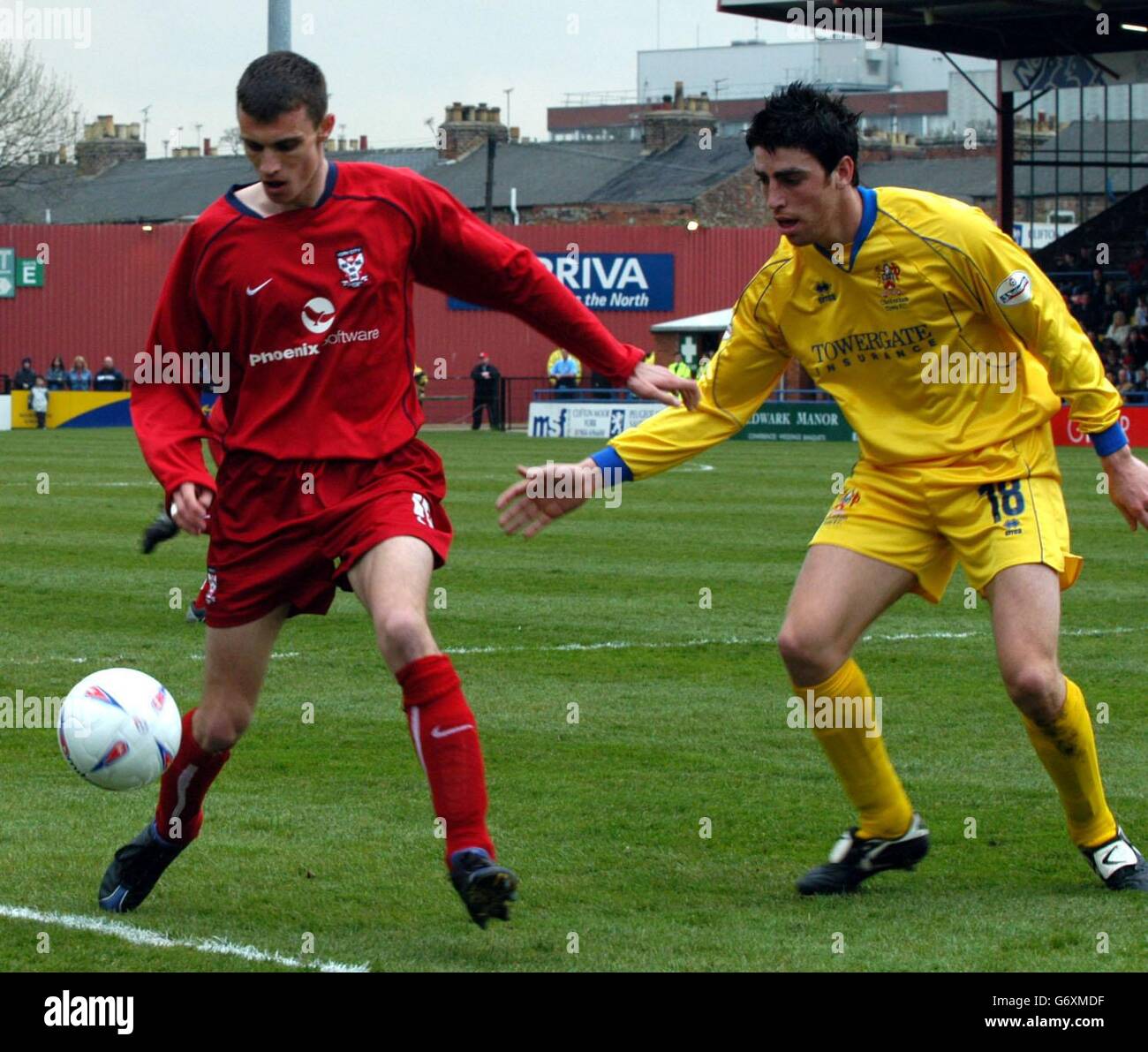 Jon Newby (left) of York City in action against Cheltenham Town's Shane ...