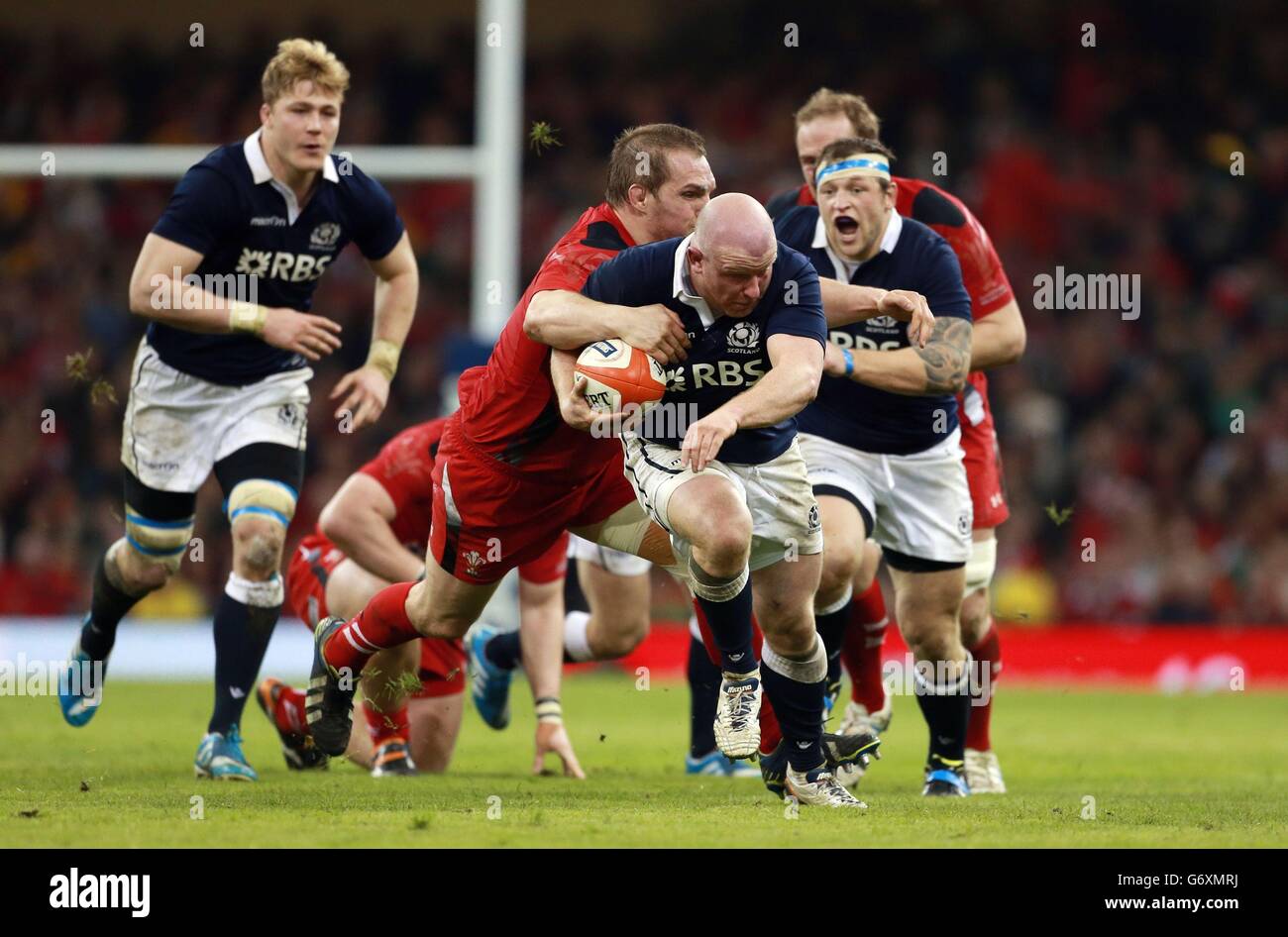 Scotland's Scott Lawson is tackled by Wales Gethin Jenkins during the ...