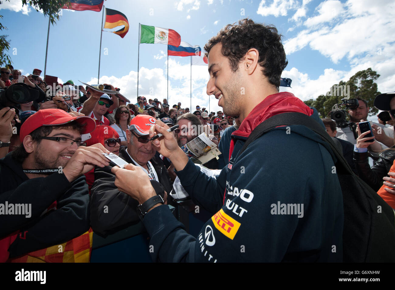 Australia's Daniel Ricciardo of Infiniti Red Bull Racing signs ...