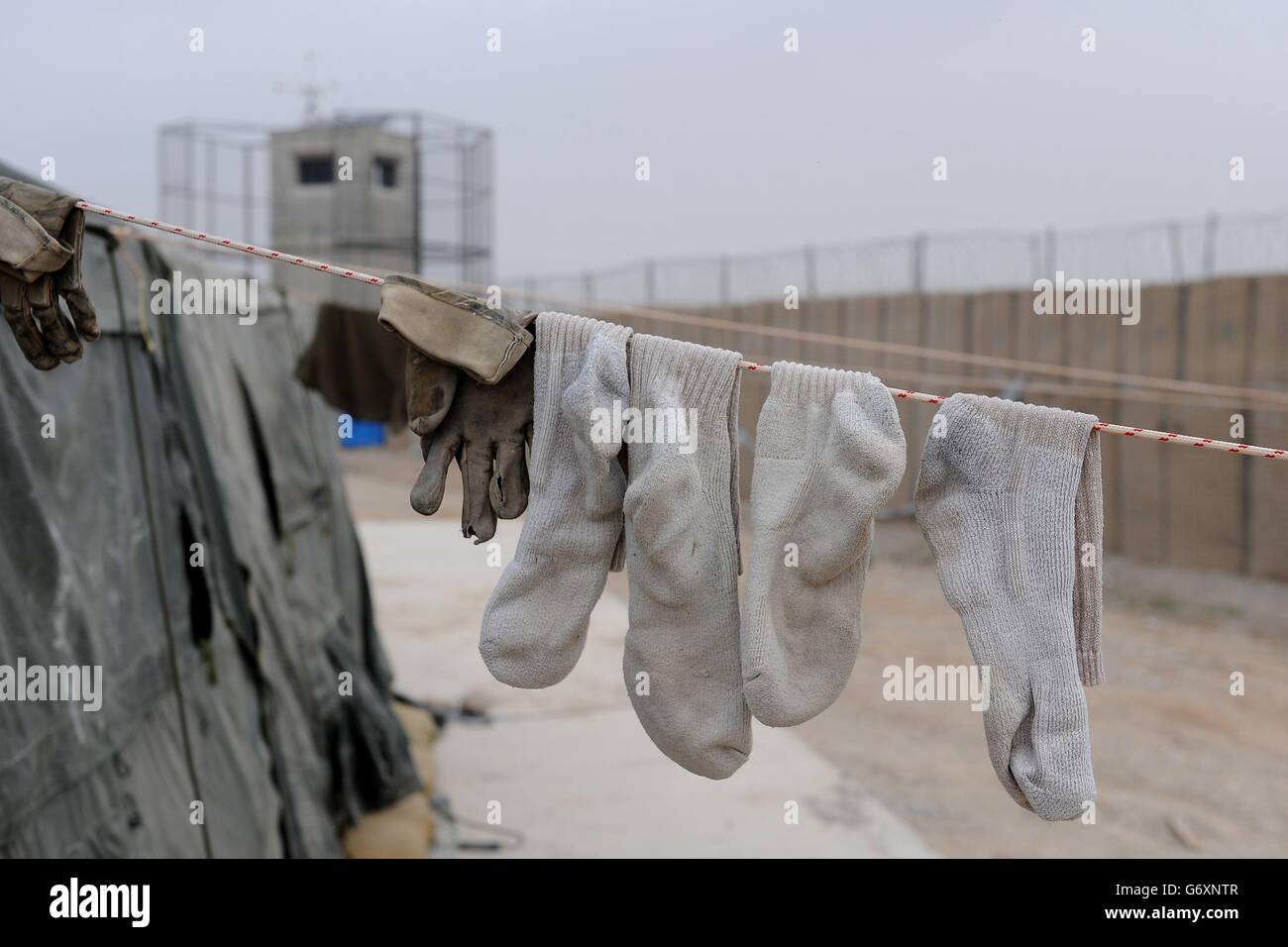 Drying laundry on makeshift washing lines as conditions have become ...