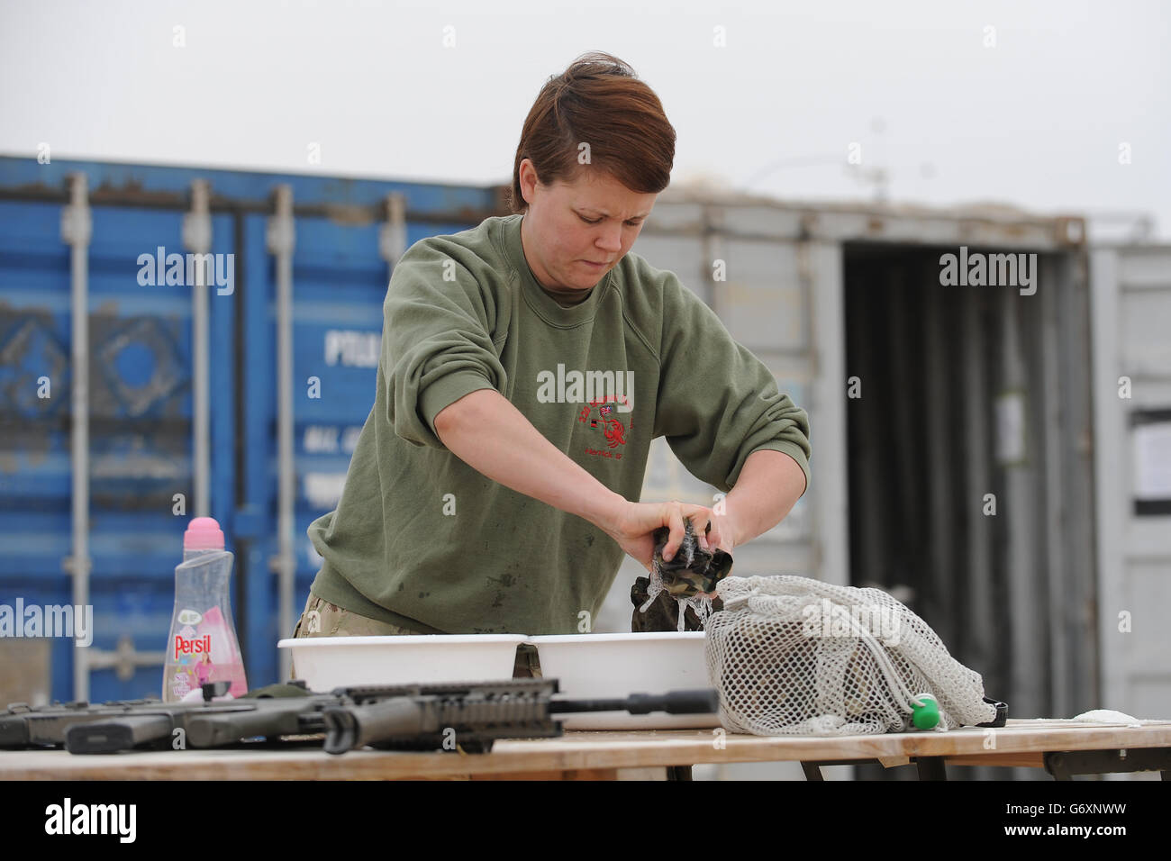 22/02/14 Corporal Samantha Rodway of 220 Signal Squadron hand washing ...