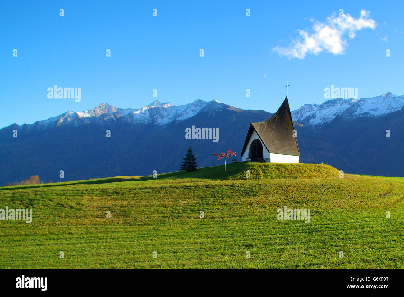 a small church on top of the mountain is a destination for excursions ...