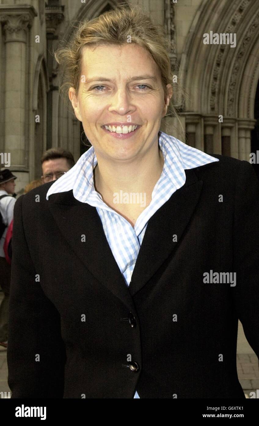 Kerry Cox leaves the High Court in London, where she launched a claim ...