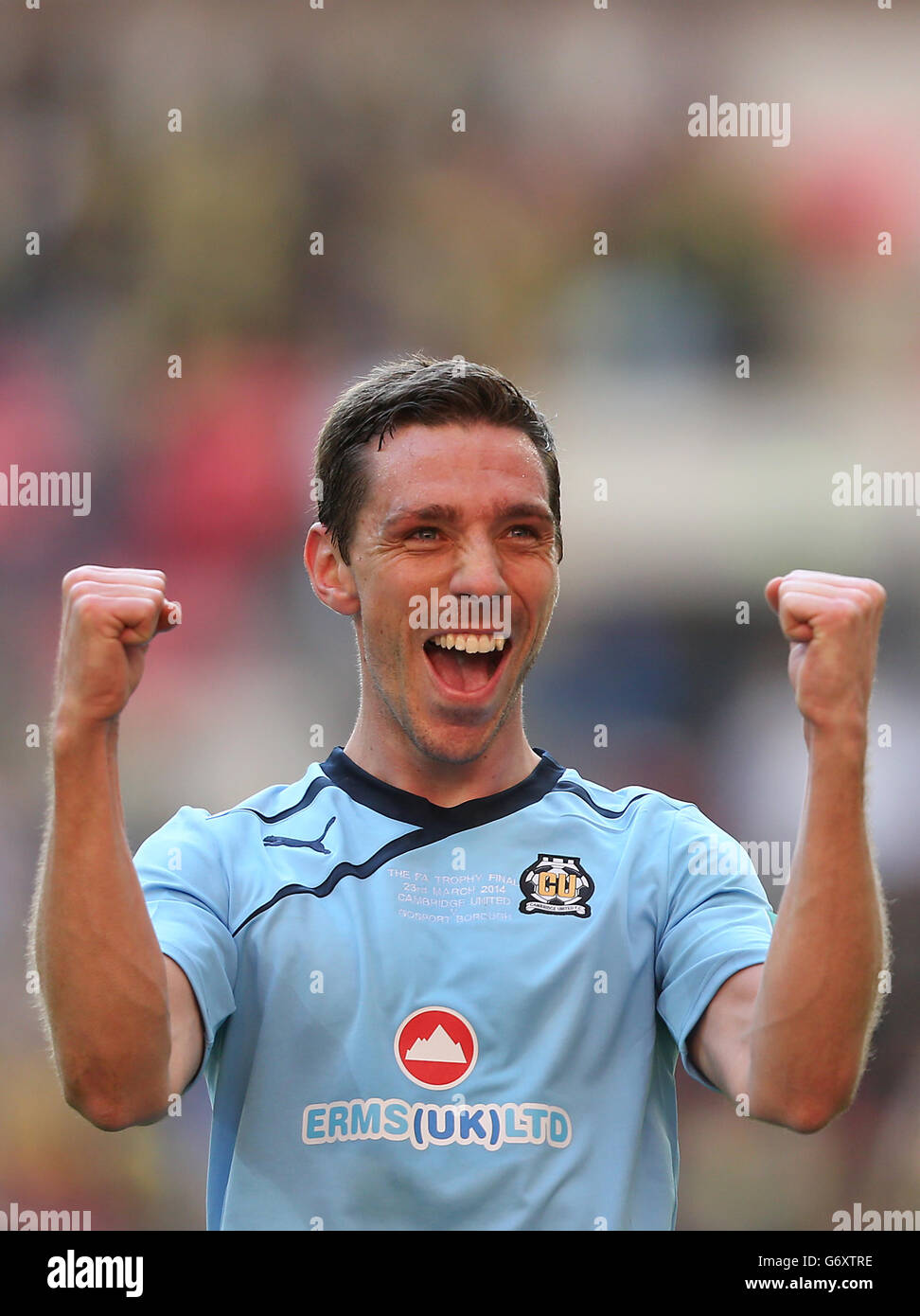 Cambridge United's Tom Champion celebrates victory at the end of the ...