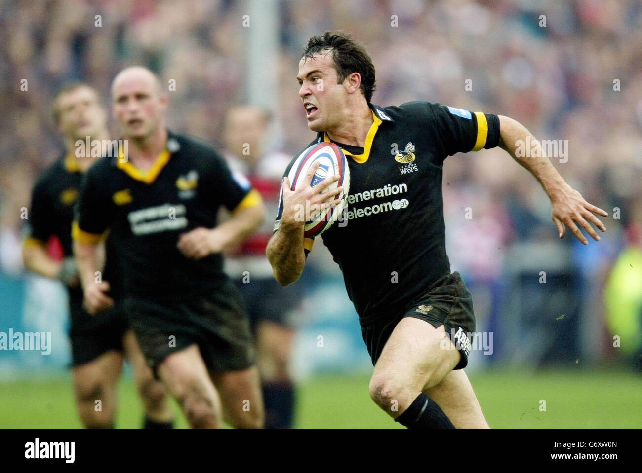 Wasps' Fraser Waters breaks away to score against Gloucester during the ...