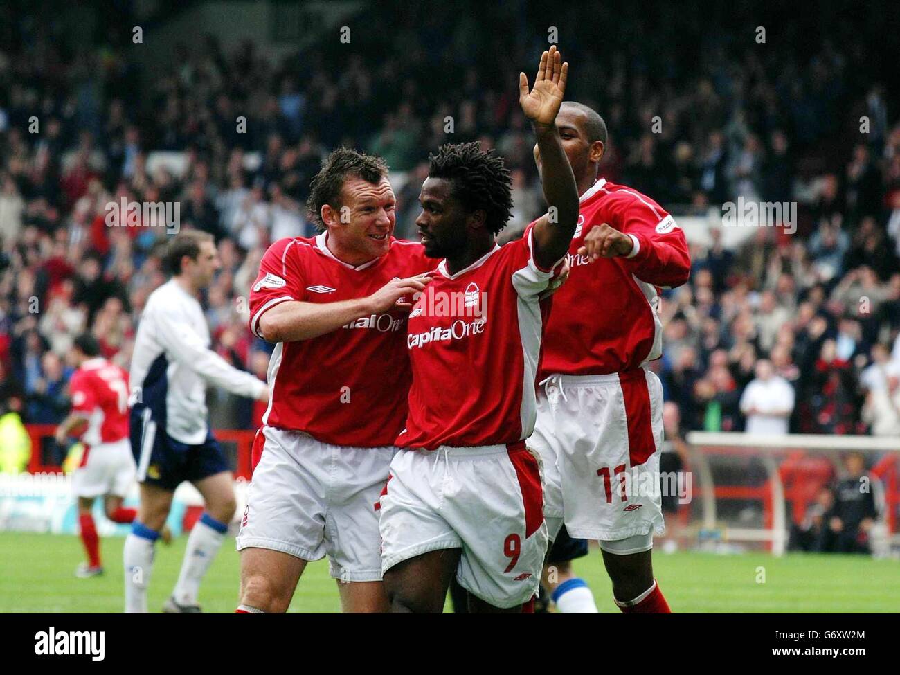 David Johnson (centre) of Nottingham Forest is congratulated by team ...