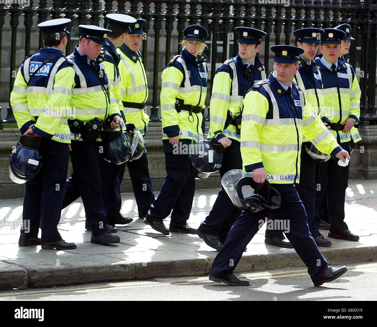 Police Officers patrol the streets of Dublin with their riot gear ...