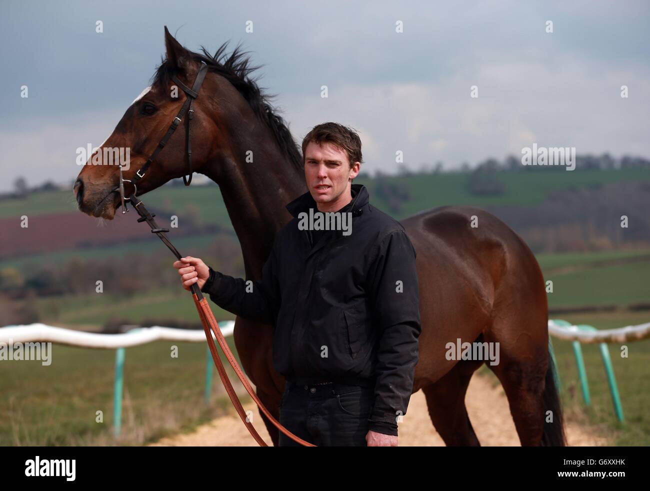 Trainer Michael Scudamore with Monbeg Dude during the stable visit at ...