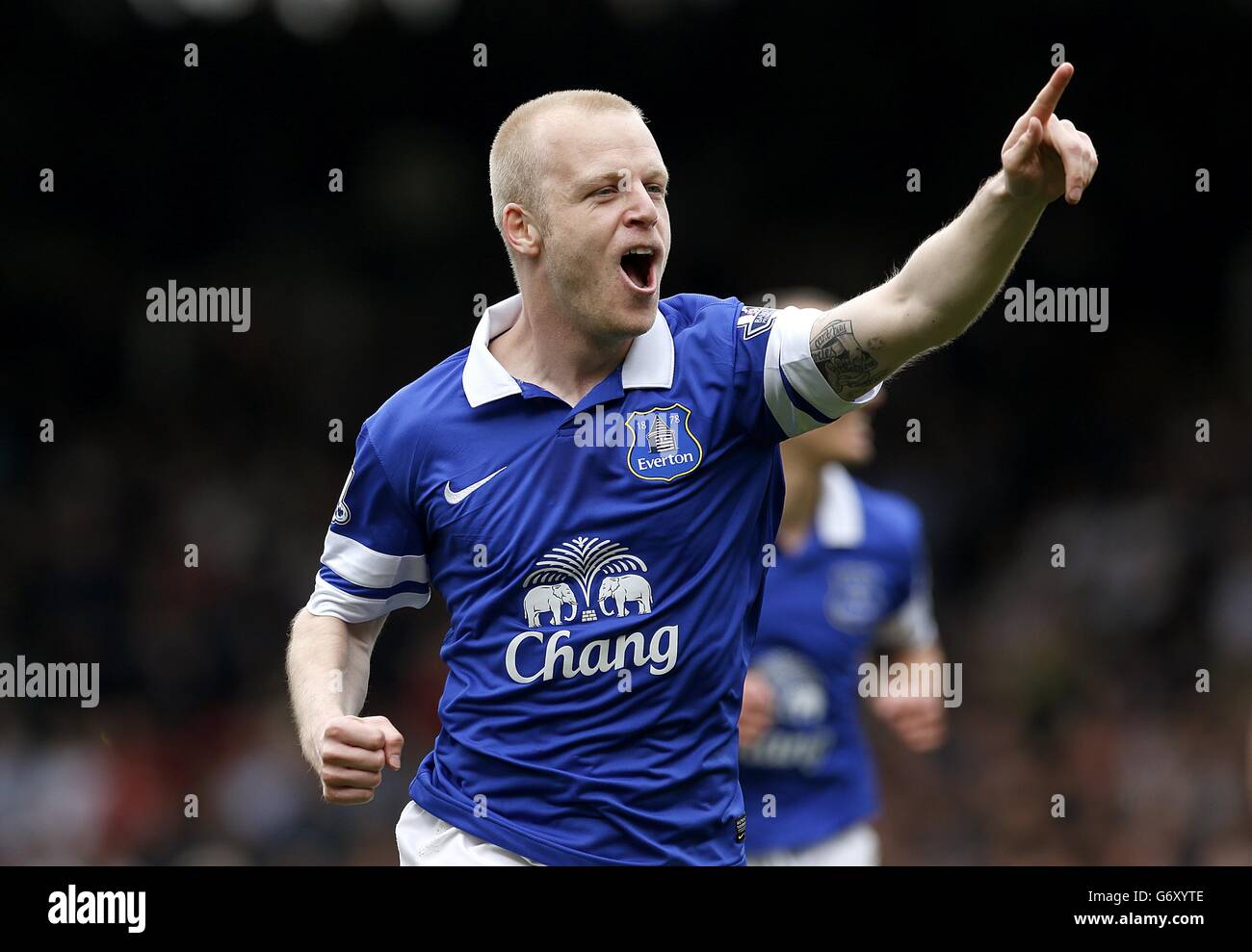 Everton's Steven Naismith celebrates after his shot is deflected in by ...