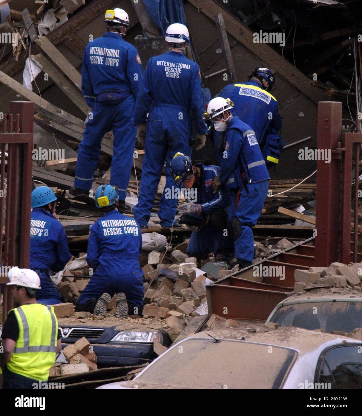The International Rescue Corp check a car which has been buried at the ...